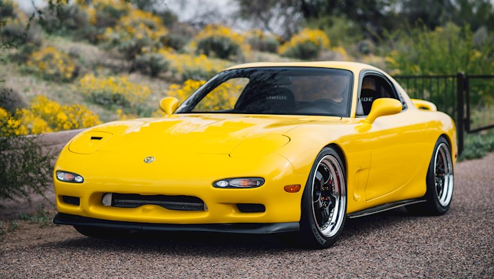 Tim Eull's Competition Yellow Mica Mazda RX-7 R1 | DrivingLine