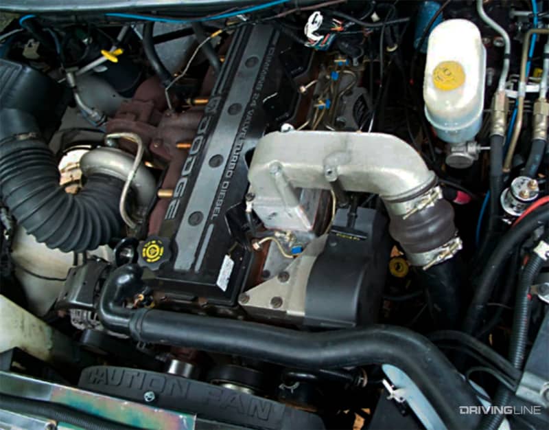 5.9L ISB Cummins vs. 7.3L Power Stroke: Diesel History | DrivingLine